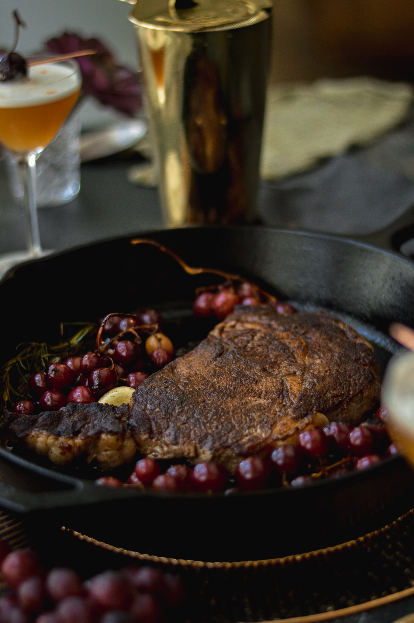 Cast Iron Rib-Eye Steak with Blistered Grapes - The Gourmet Bon Vivant